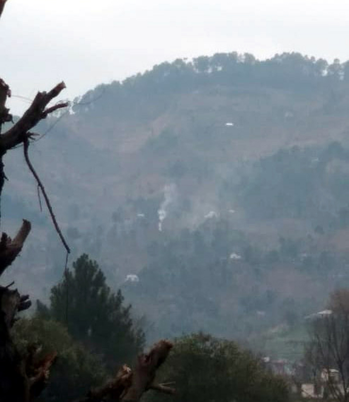 Smoke billows out of mortar shells fired by Pakistan army in Jhallas ...