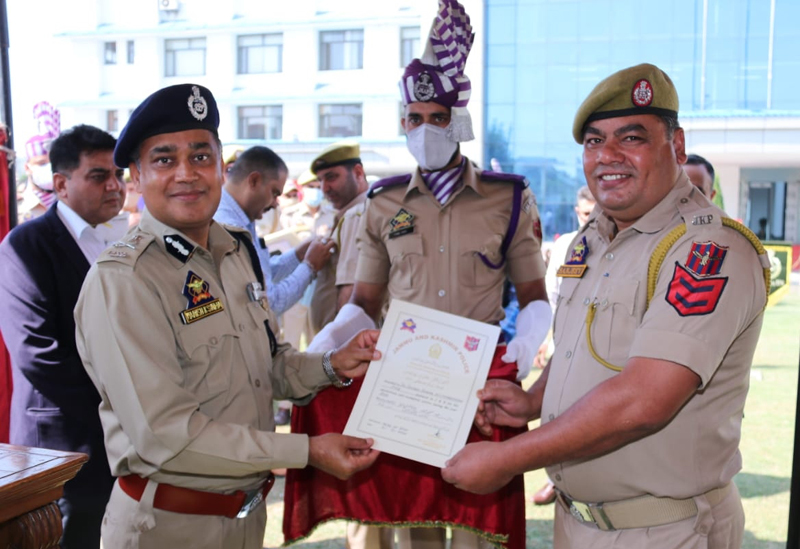 ADGP Headquarters M K Sinha presenting DGP commendation certificate to ...