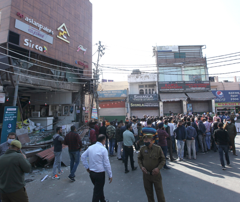 Shopkeepers and people during protest at Shivaji Chowk in Jammu ...