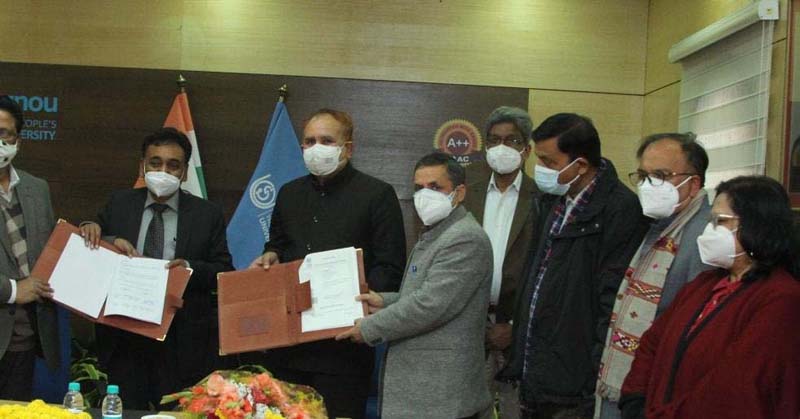 Representatives of IGNOU and MSDE displaying copies of MoU signed ...