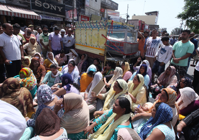 Family members, others block road over killing of man in accident ...