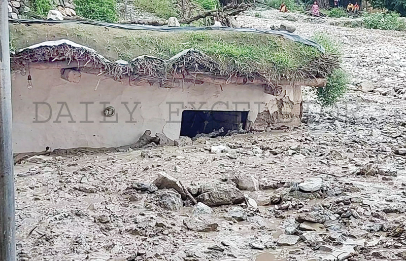 A house buried under debris after landslide & rain at Talwara migrant ...
